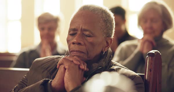 Elderly African woman, praying and church for religion, faith or love ...