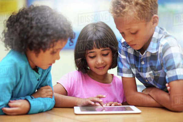 Happy children, tablet and students in classroom for elearning ...