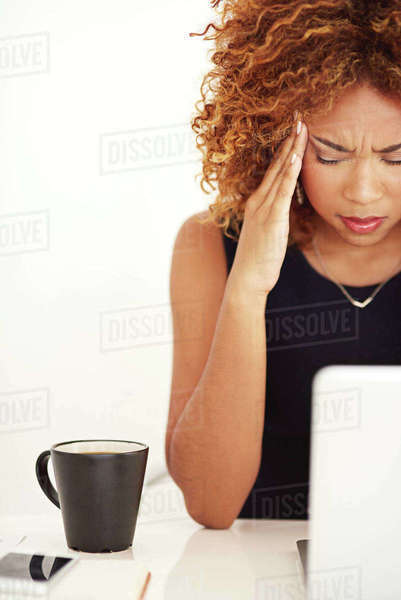 Sad, headache and woman with a laptop email isolated on a white ...