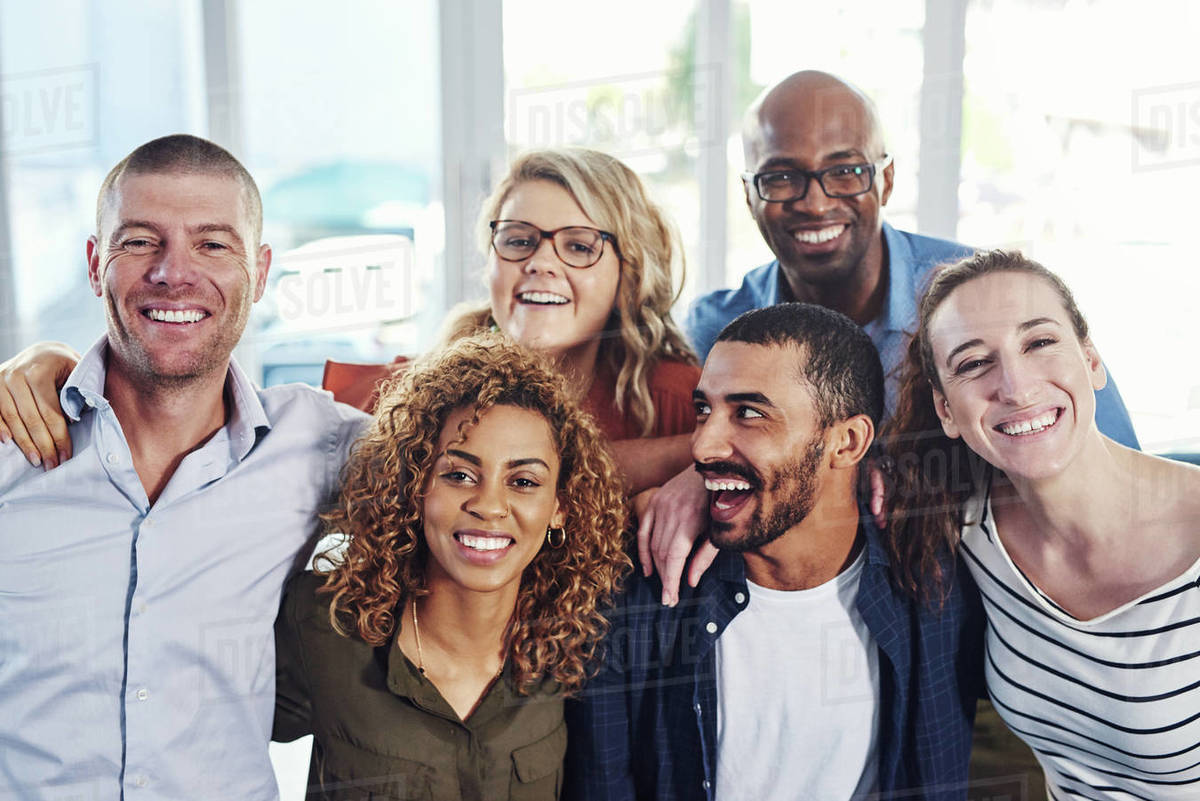 Business, friends portrait and hug in a office with a smile from copywriter teamwork and ...