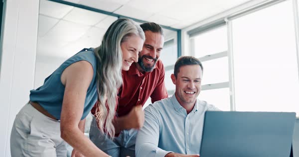 Success, winner and business people high five at laptop for celebration ...