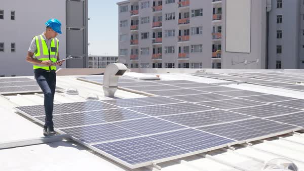 Solar panels, contractor with checklist and inspection, renewable ...