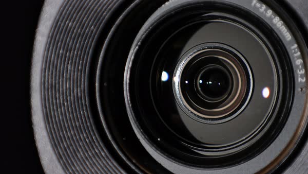 Close up of Camera Lens with Flare on Optical Glass. Process of Zooming ...