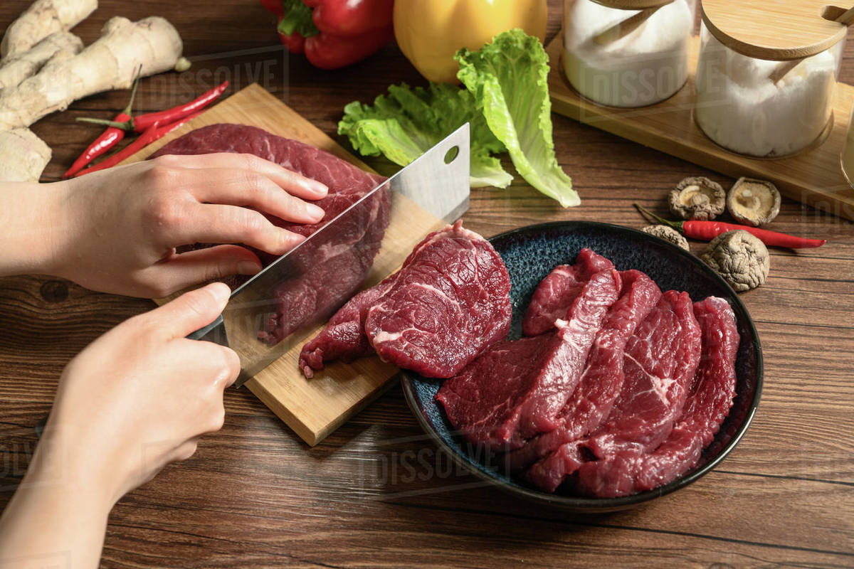 Raw beef with wooden table background, still life photography ...
