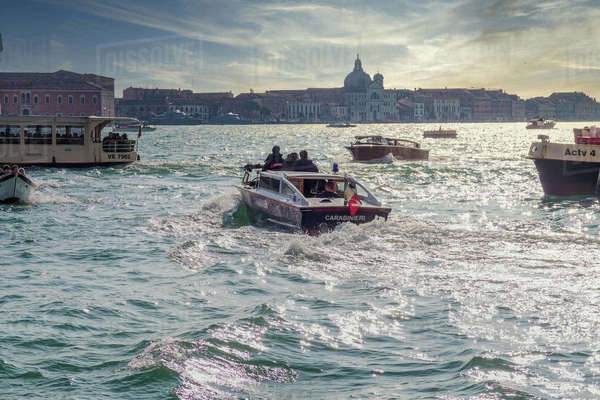 Venice, Italy Carabinieri Police Boat on the lagoon. Evening view of ...