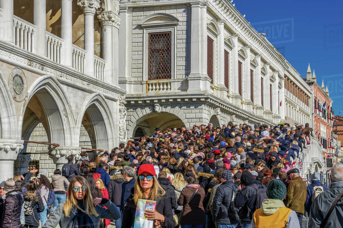 Venice, Italy Dense crowd packed on a bridge. Large number of ...