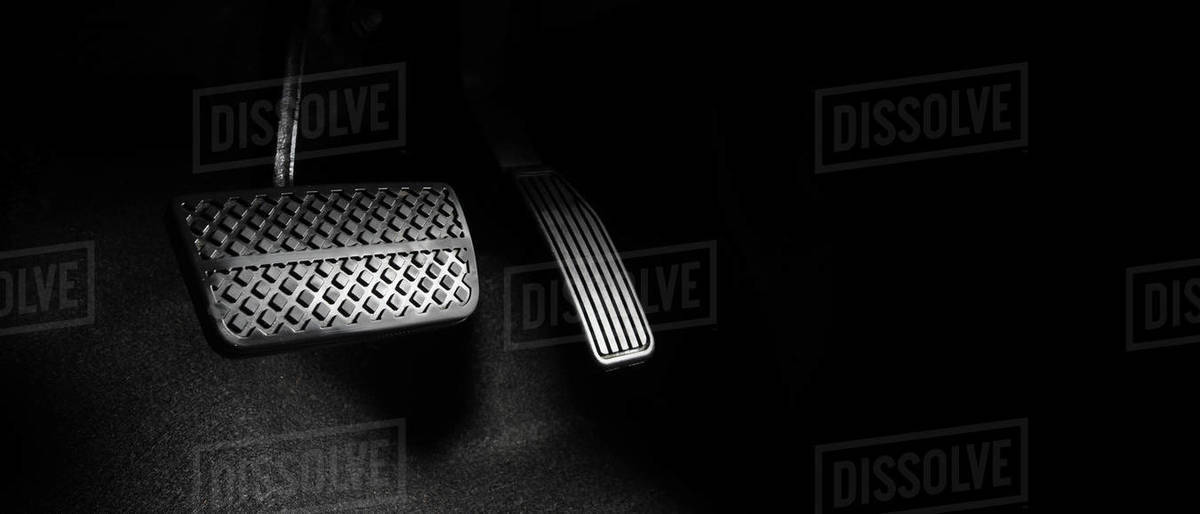 Close up the foot pressing foot pedal of a car to drive. Accelerator ...