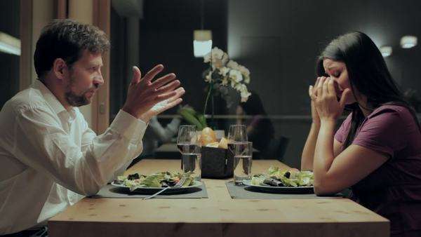 Unhappy woman feeling sad during dinner at home with man - Stock Video ...