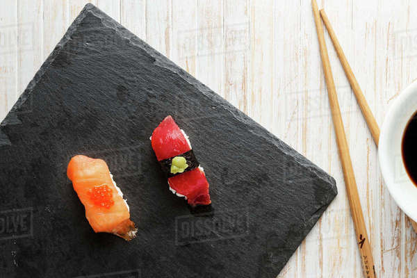 Salmon Nigiri with Salmon Roe and red tuna with wasabi paste Nigiri on ...