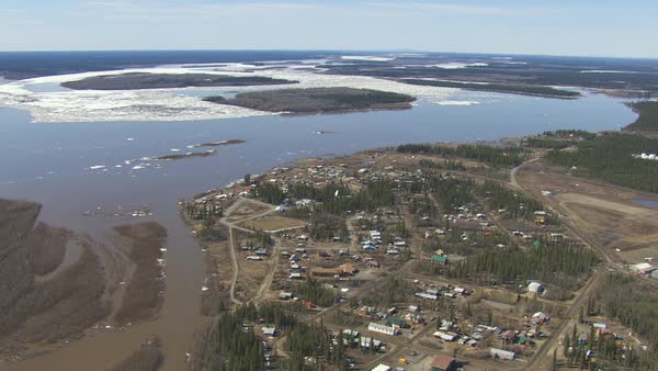 Aerial view Fort Yukon city and Fort Yukon frozen river ice breakup ...