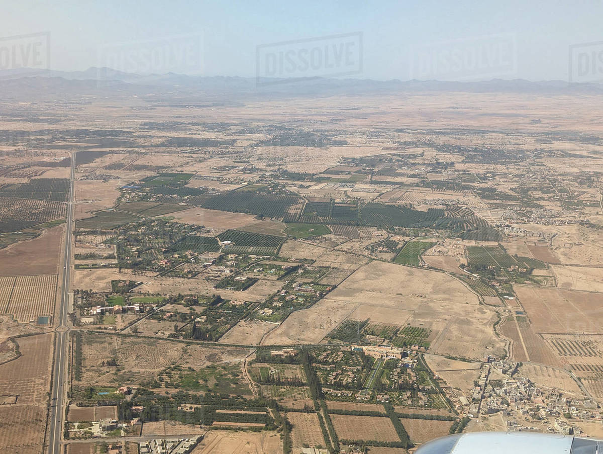 Aerial view of the Moroccan landscape and Marrakesh seen from an ...