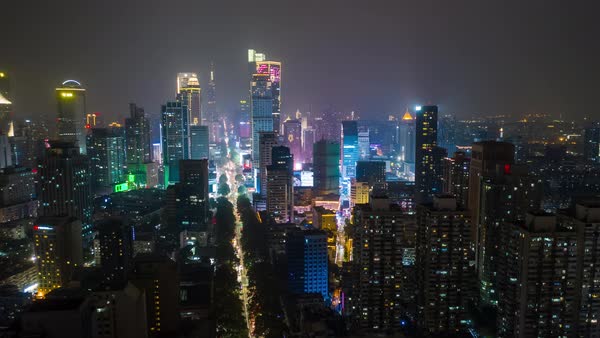 Flight over nanjing city downtown district night illumination show ...