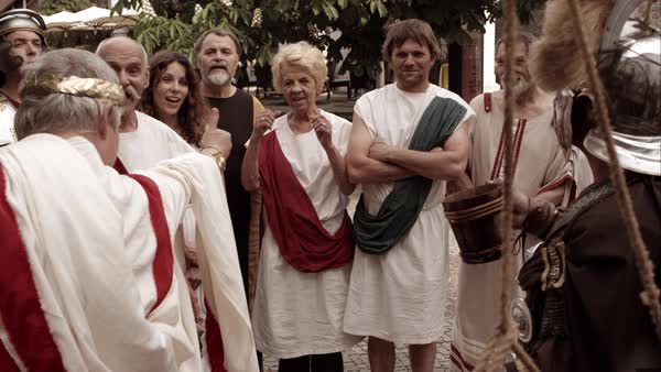 Emperor gives thumbs up to crowd of romans who begin to cheer - Stock ...