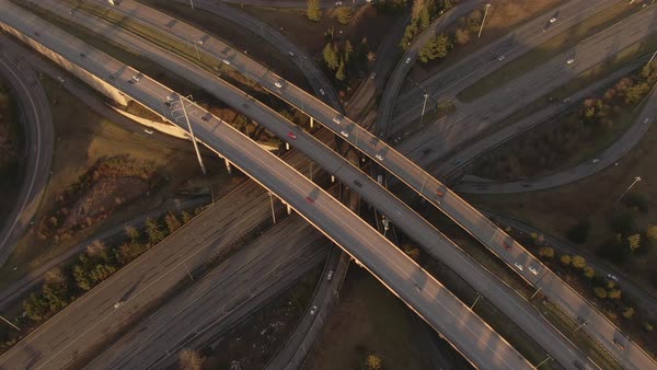 DRONE: Stunning aerial view of a bustling interstate turnpike on sunny ...