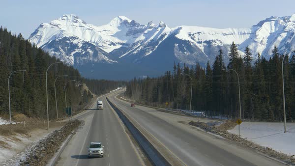 AERIAL: Flying above the famous Trans Canada Highway as vehicles drive ...
