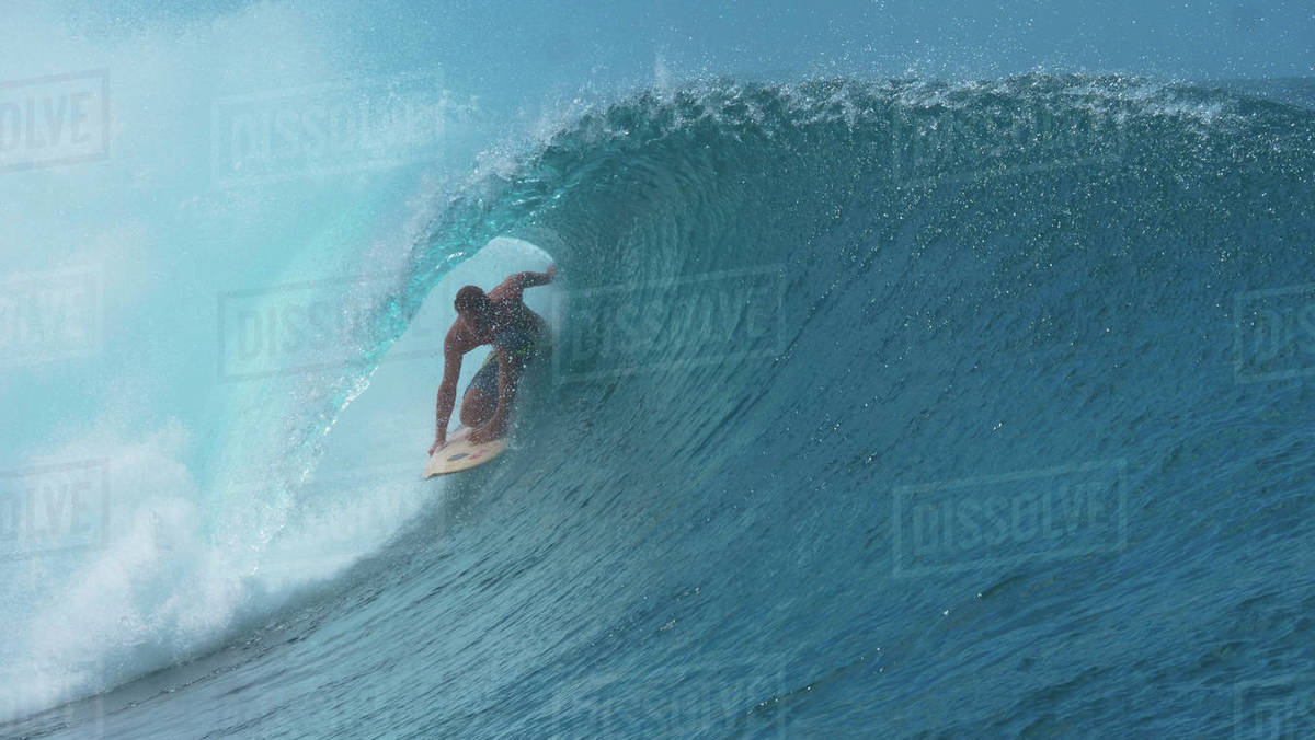 CLOSE UP: Stunning emerald water curls over cool pro surfer riding ...