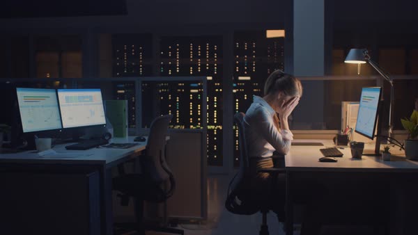 Overworked tired female worker uses desktop computer but falls asleep ...