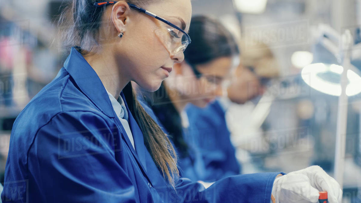 Female Electronics Factory Worker in Blue Work Coat and Protective ...