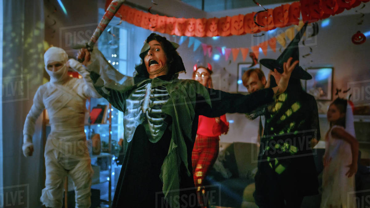 Halloween Costume Party: Group of Monsters Dancing in Decorated Room ...