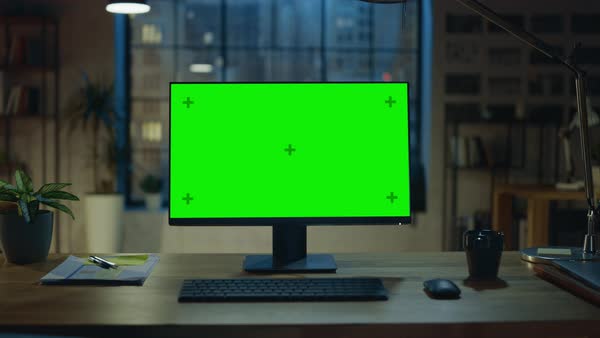 Computer desktop with green screen in a modern office - Stock Video ...