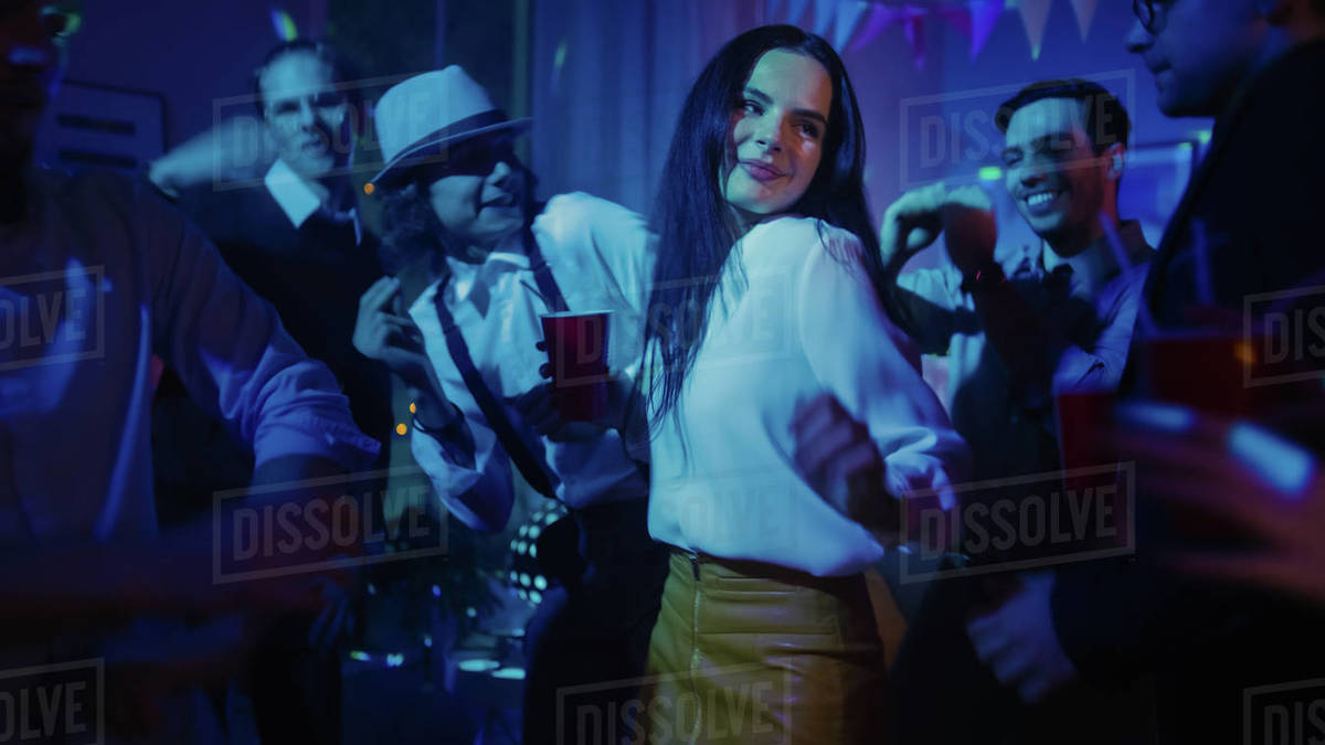 A group of students dance together at a college party. - Royalty-free ...