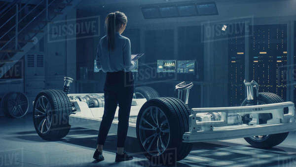 Automobile Female Engineer Working on Electric Car Chassis Prototype ...