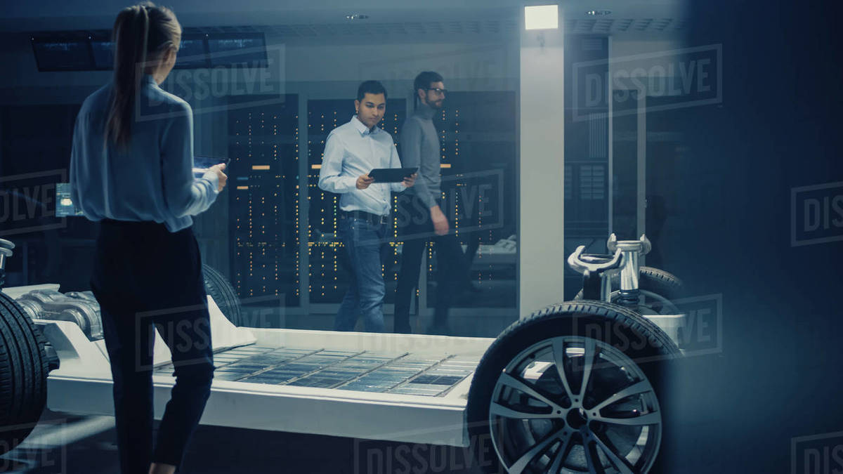 Team of Automotive Engineers Working on Electric Car Chassis Platform ...