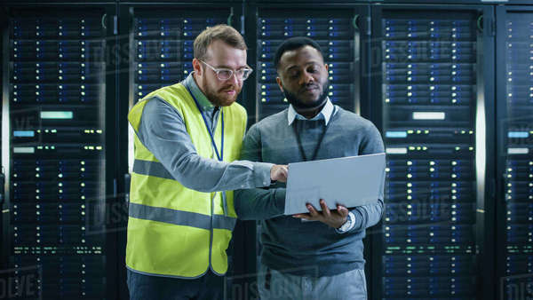 Bearded IT Specialist in Glasses and High Visibility Vest and Black ...