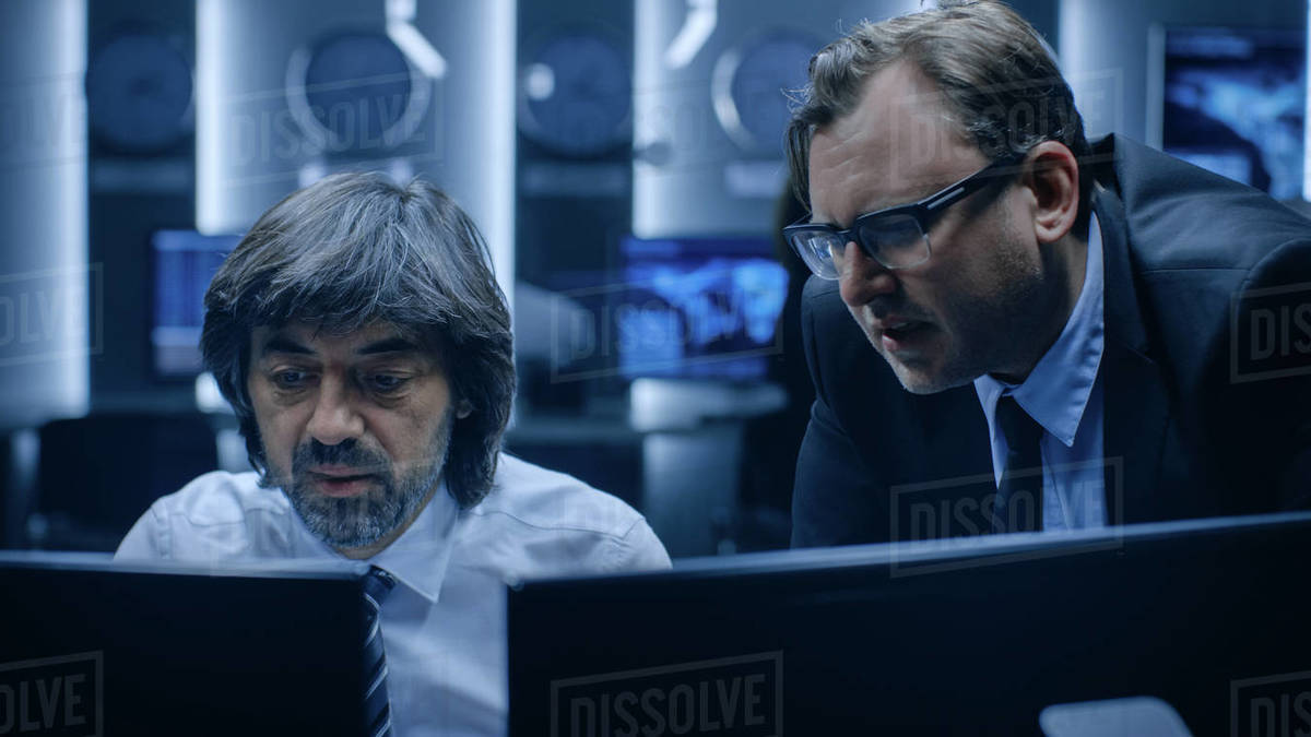 IT Professional Information Officer working on Personal Computer in ...