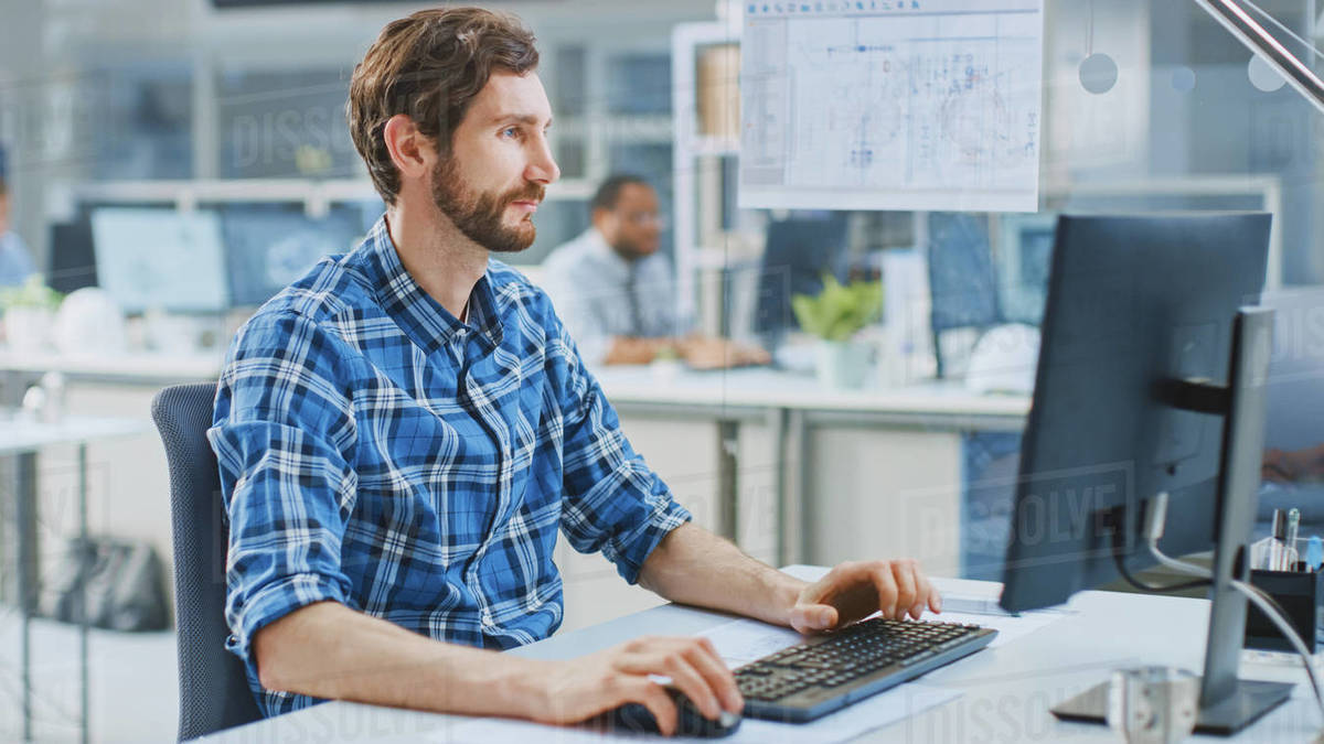 In the Industrial Engineering Facility: Portrait of the Handsome Smart ...