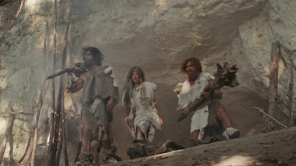 Tribe of Hunter-Gatherers Wearing Animal Skin Holding Stone Tipped ...