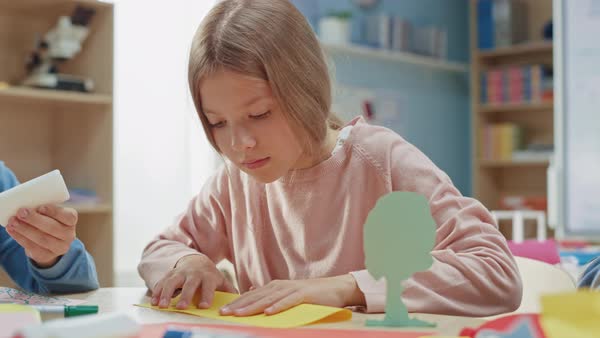 Elementary School Arts & Crafts Class: Cute Little Blond Girl Has Fun ...