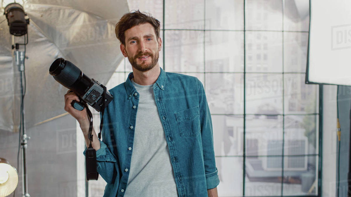 In the Photo Studio with Professional Equipment: Portrait of the ...