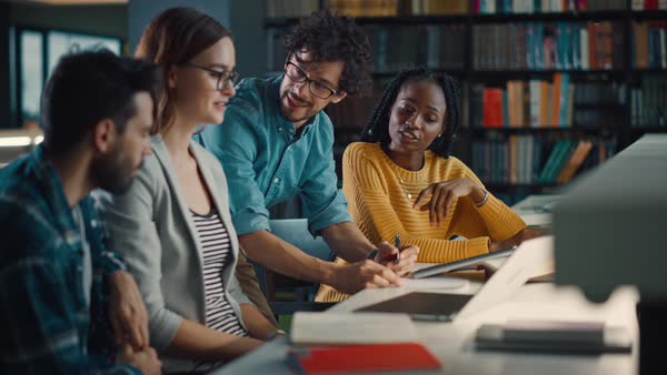 University Library: Diverse Group of Gifted Students Have Discussion ...