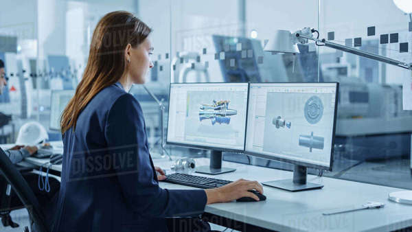 Portrait of Young and Confident Industrial Engineer Working on Computer ...