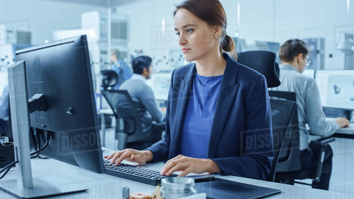 Modern Factory Office: Portrait of Young and Confident Female ...