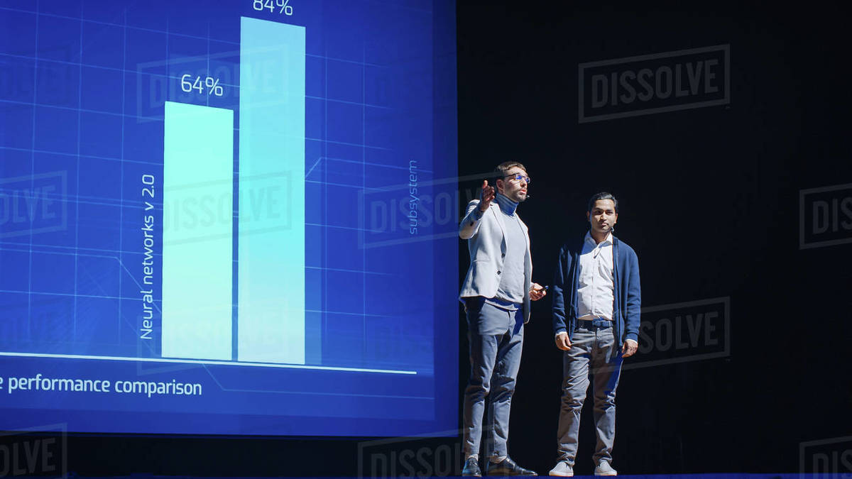 Startup CEO and Chief Developer Stand on Stage and Present New Product ...