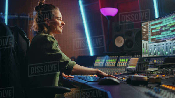 Beautiful, Stylish Female Audio Engineer and Producer Working in Music ...