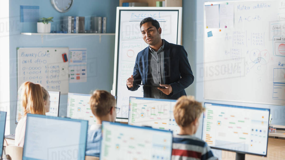 Elementary School Computer Science Class: Teacher Uses Digital Tablet ...