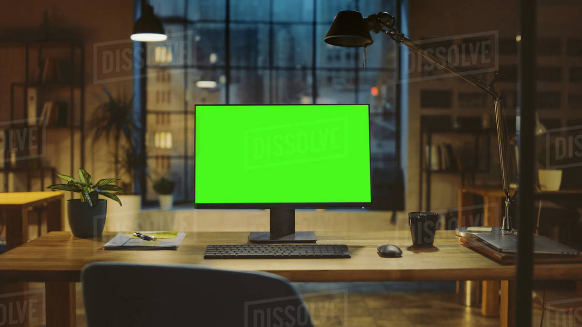Desktop Computer with Mock-up Green Screen Standing on the Wooden Desk ...