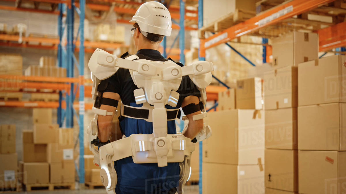 High-Tech Futuristic Warehouse: Worker Wearing Advanced Full Body ...