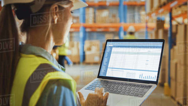 Professional Female Worker Wearing Hard Hat Holds Laptop Computer with ...