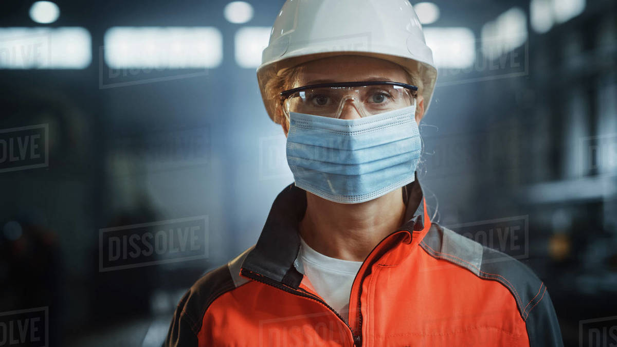 Portrait of a Professional Heavy Industry Engineer Worker Wearing on ...
