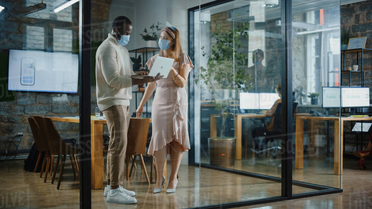 CEO and Chief Executive Wearing Face Masks Talking About Company ...