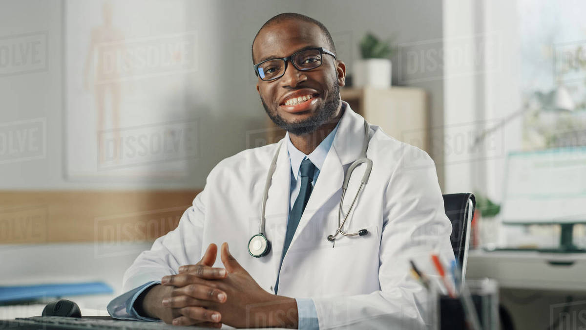 African American Physician is Making a Video Call with a Patient. Black ...