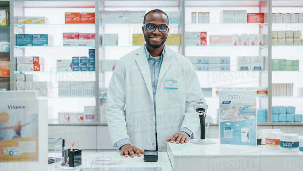 Portrait of Professional Black Male Pharmacist Wearing White Lab Coat ...