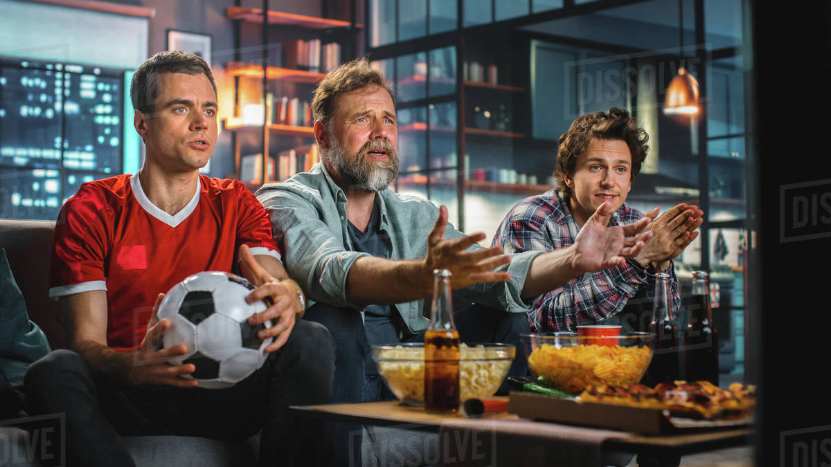 Night At Home: Three Joyful Soccer Fans on a Couch Watch Game on TV ...