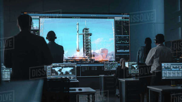 Group of People in Mission Control Center Witness Successful Space ...