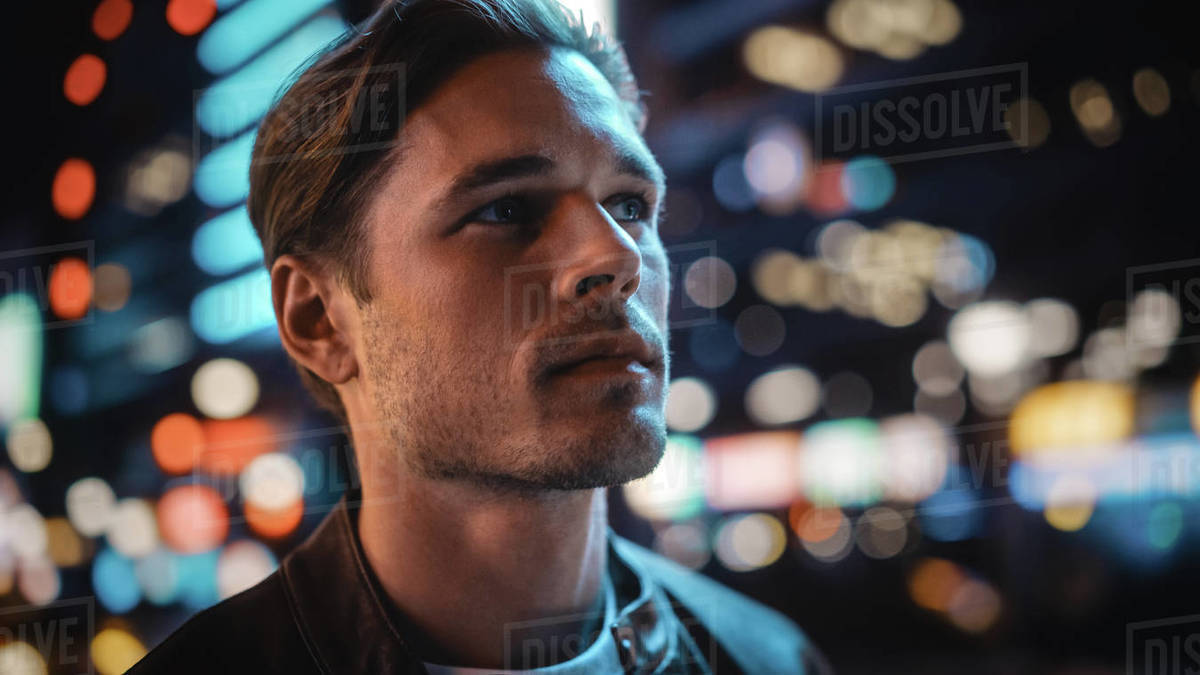 Portrait of Handsome Serious Man Standing, Looking Around Night City ...
