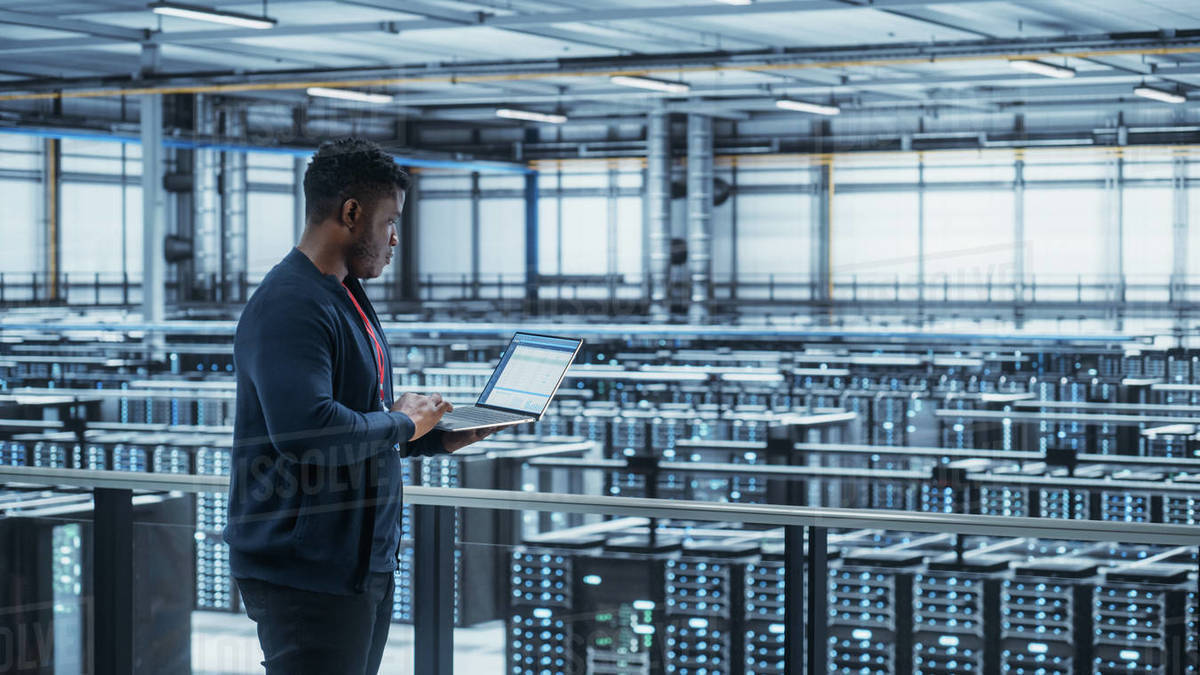 Data Center Engineer Using Laptop Computer - Royalty-free Stock Photo ...